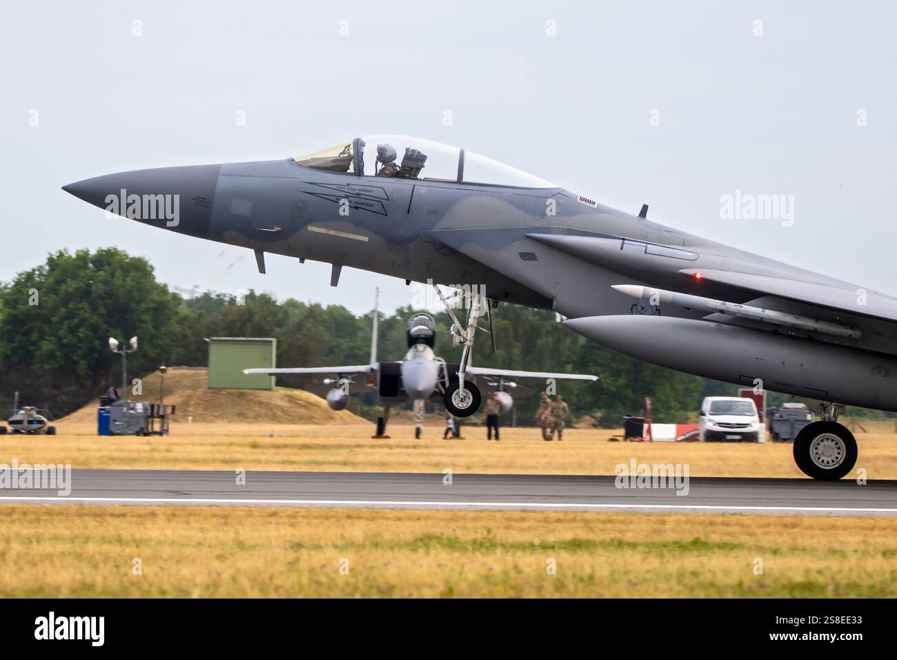 US Air Force McDonnell Douglas F-15C Eagle fighter jet taking off from Hohn Air Base during NATO ...