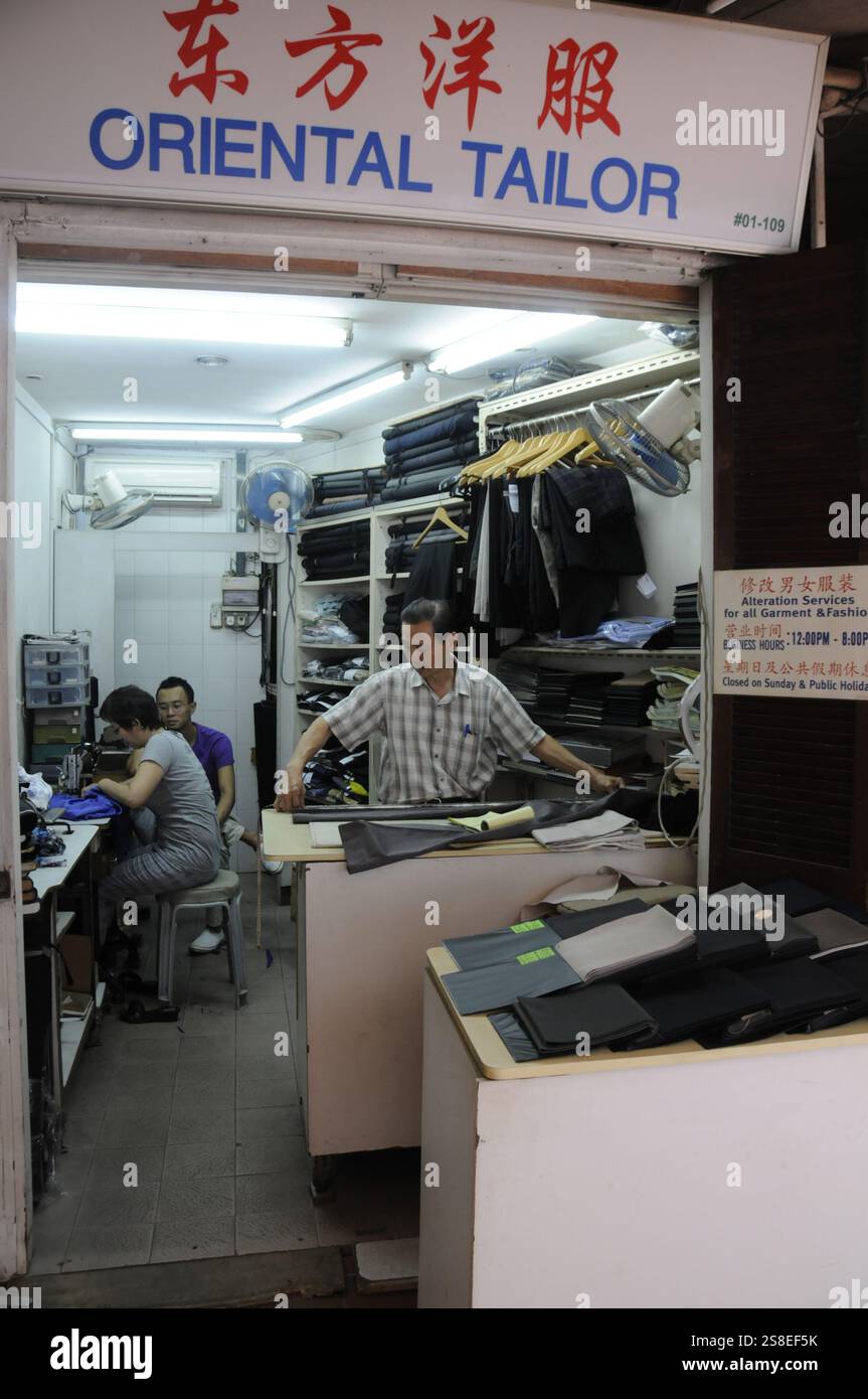 A Chinese tailor in an open front shop in Singapore Stock Photo - Alamy