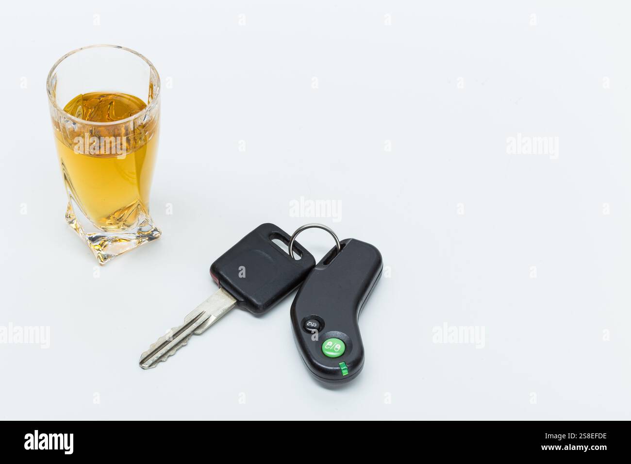 Car key on the bar with spilled alcohol Stock Photo - Alamy