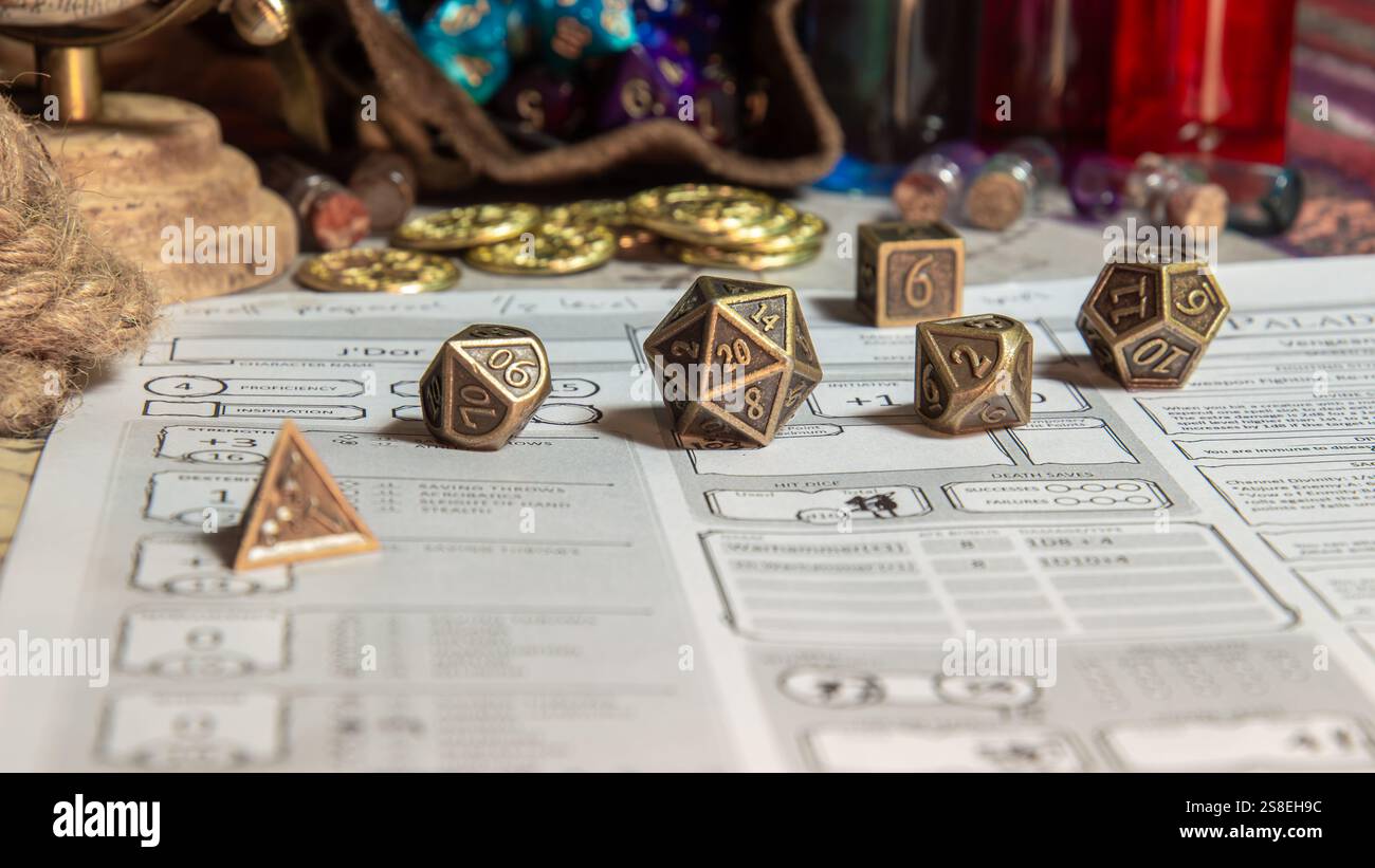 Close-up of brass RPG dice on a character sheet, surrounded by gold ...