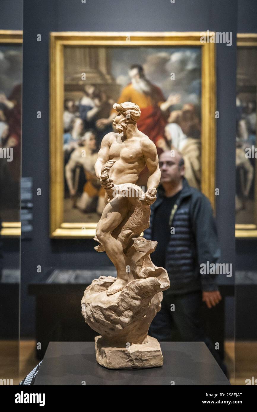 AMSTERDAM - Visitors at the Rijksmuseum view the model statue of the ...