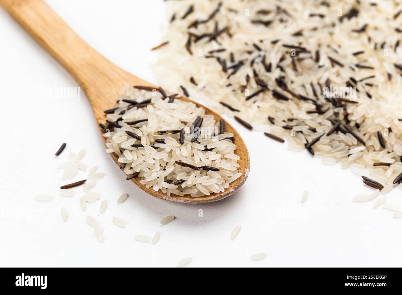 Heap of boiled mixed brown rice isolated on white Stock Photo - Alamy