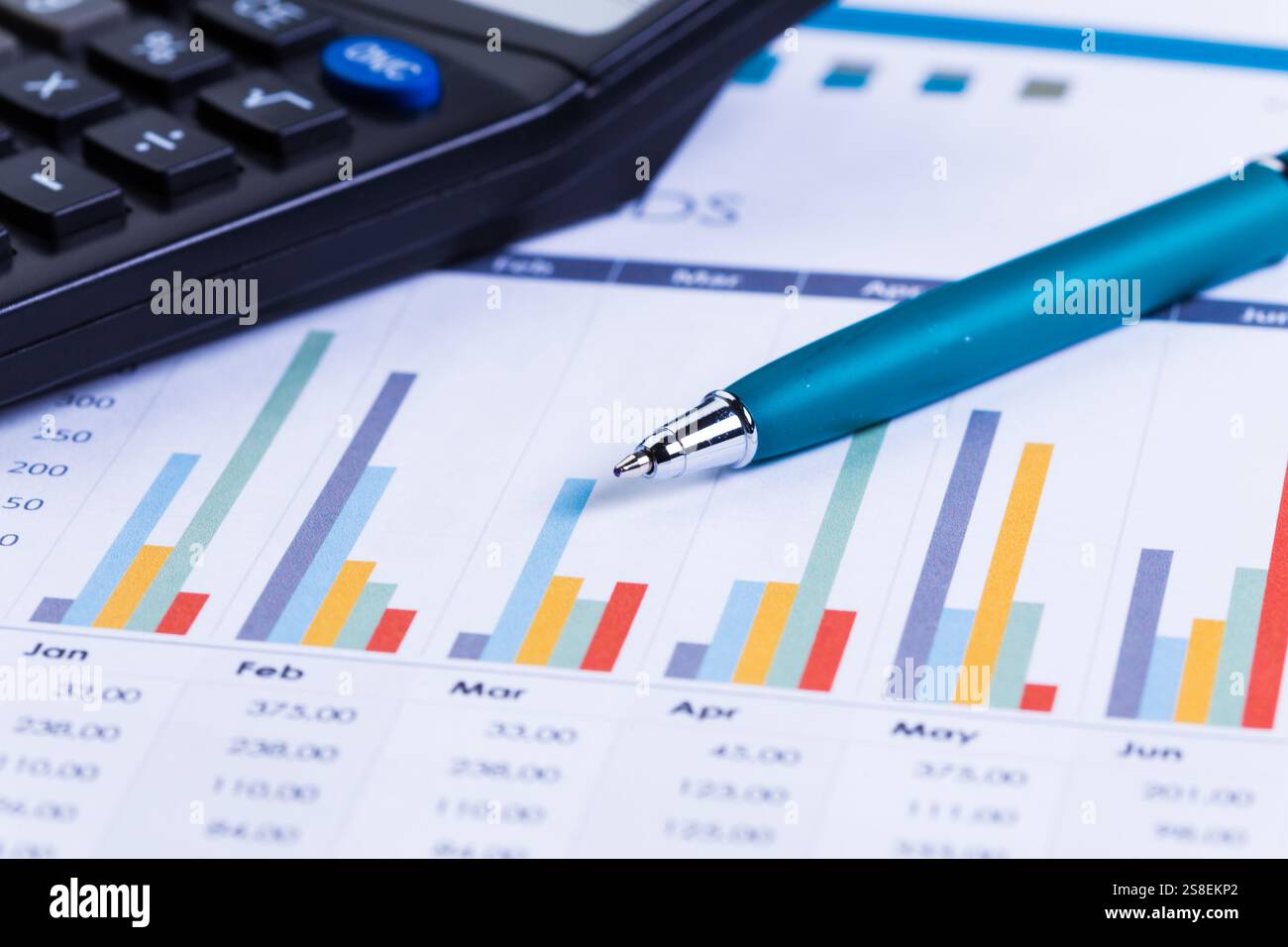 Graphs and Calculator Stock Photo - Alamy