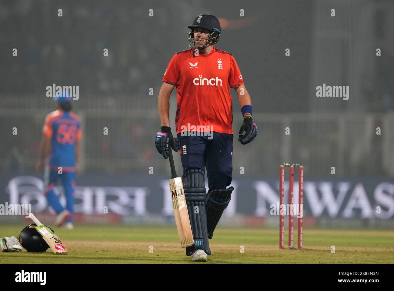 England's Jamie Overton walks off the field after losing his wicket ...