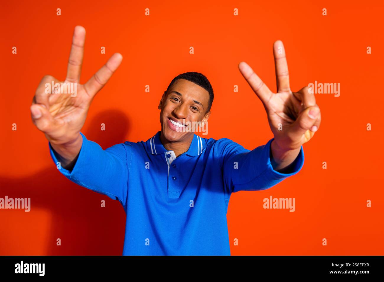 Guy shows sign peace on hi-res stock photography and images - Alamy