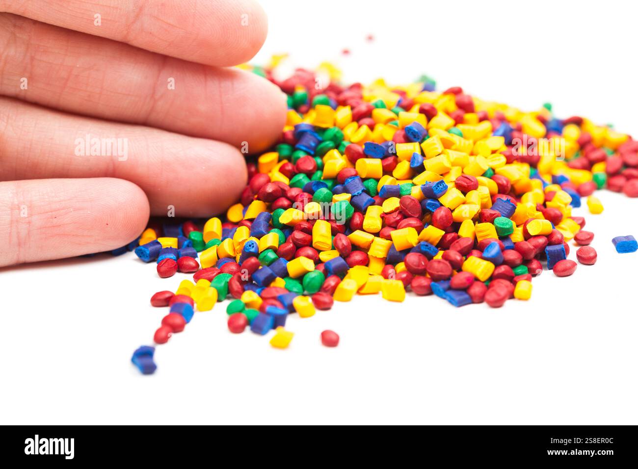 tinted plastic granulate for injection moulding process Stock Photo - Alamy