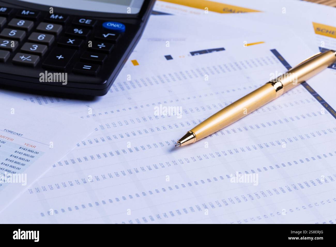 Graphs and Calculator Stock Photo - Alamy