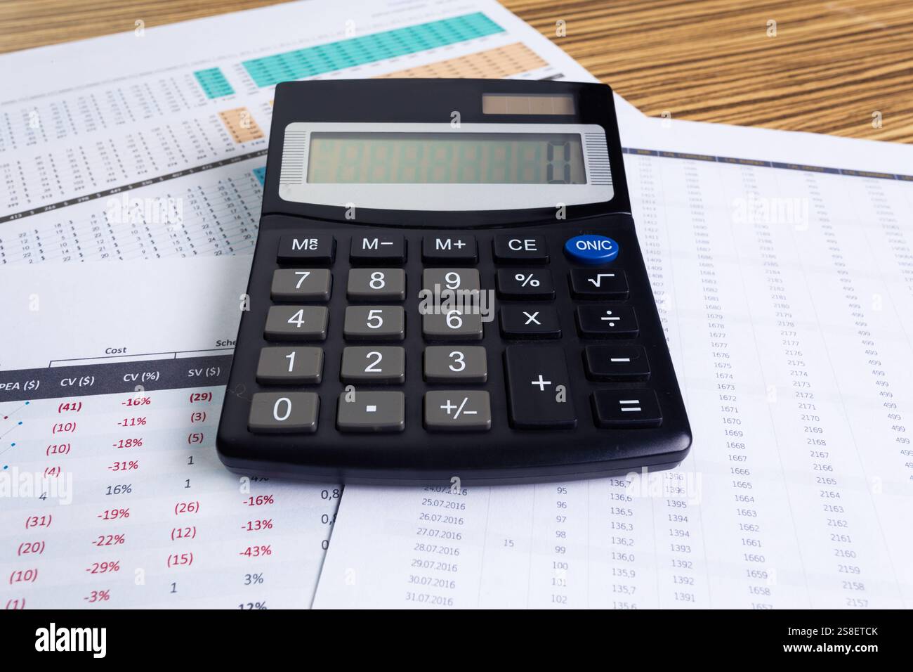 Graphs and Calculator Stock Photo - Alamy