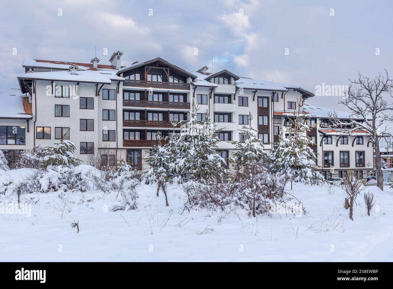 Bansko, Bulgaria winter street view, houses and Pirin snow mountain ...