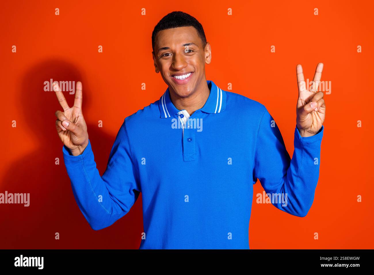 Man making peace signs hi-res stock photography and images - Alamy