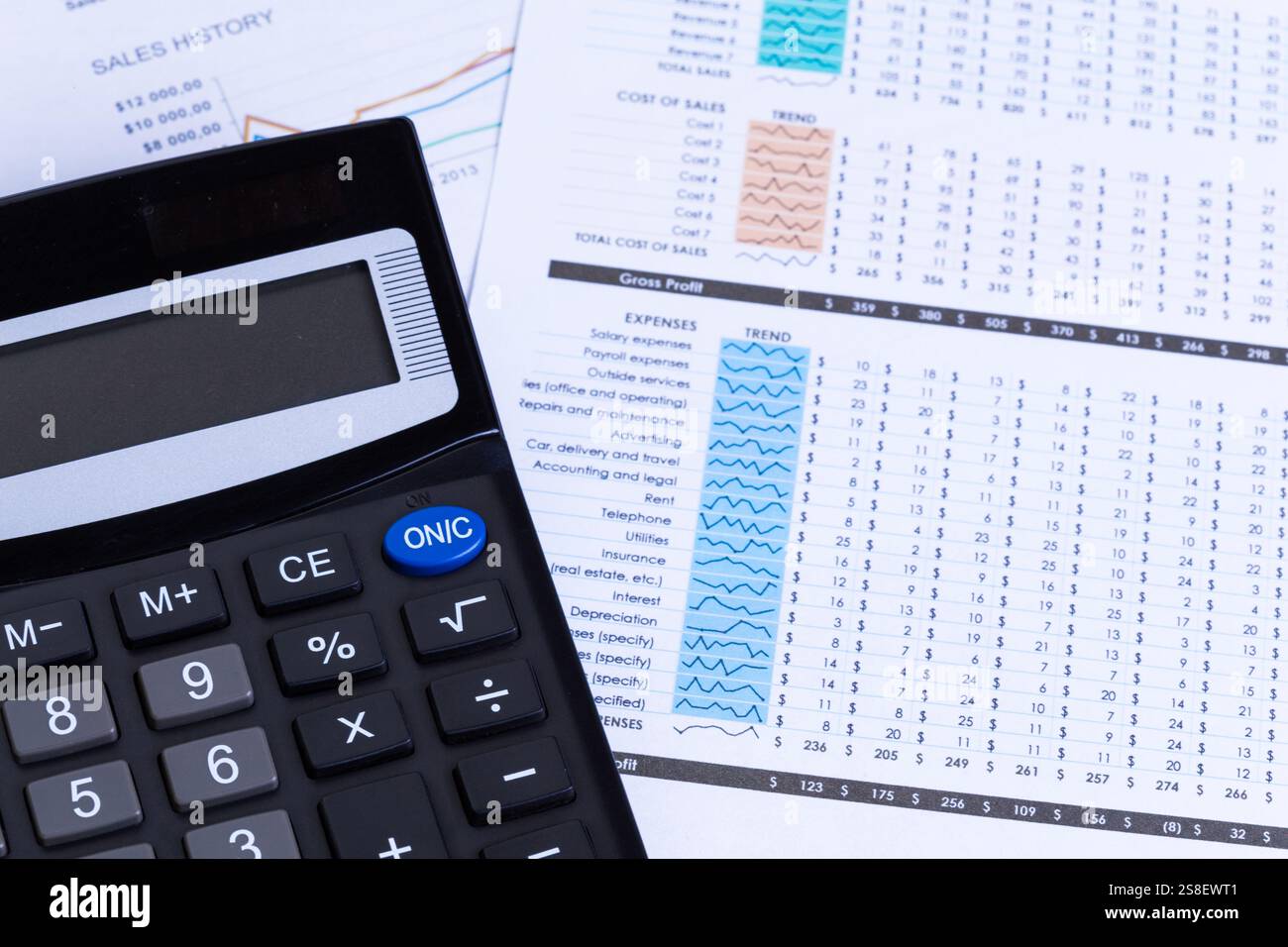 Graphs and Calculator Stock Photo - Alamy
