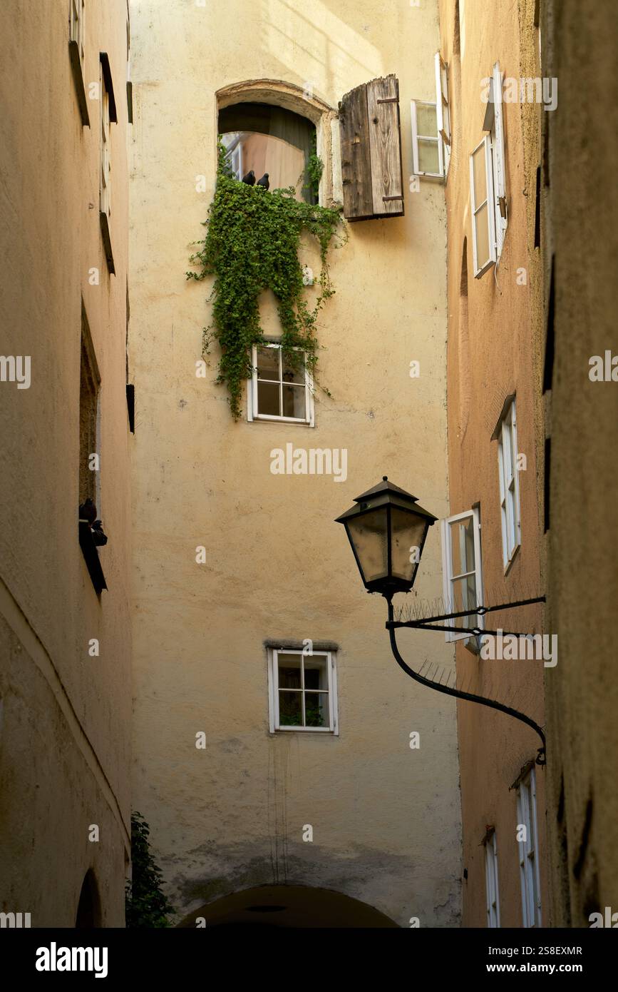 Narrow Old European Passageway. Windows looking down on a narrow ...