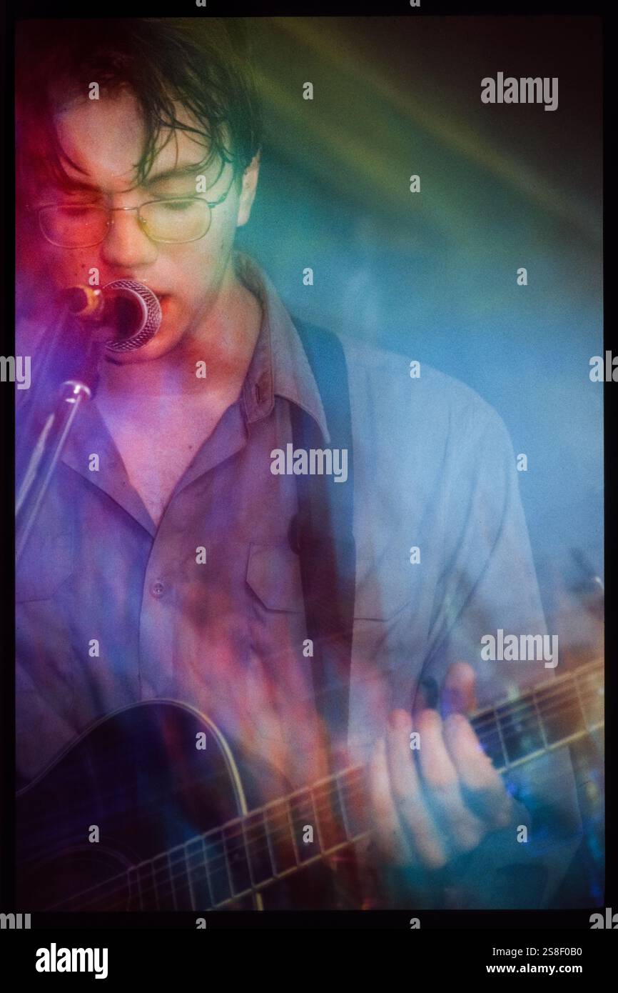 GOMEZ, EARLY CONCERT, 1998: A young Ben Ottewell of Gomez playing a ...