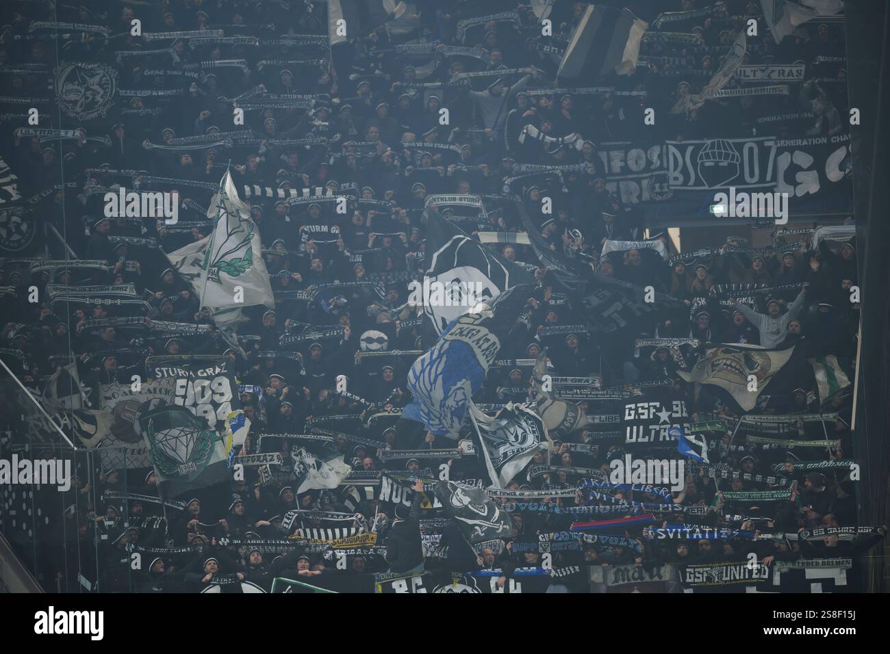 Bergamo, Italy. 21 January 2025. Fans of Sturm Graz show their support ...