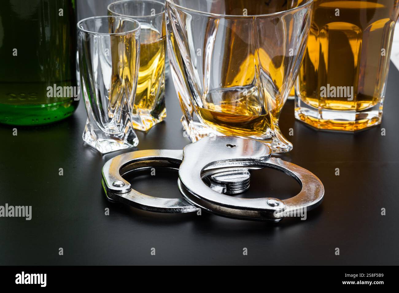 Car key on the bar with spilled alcohol Stock Photo - Alamy