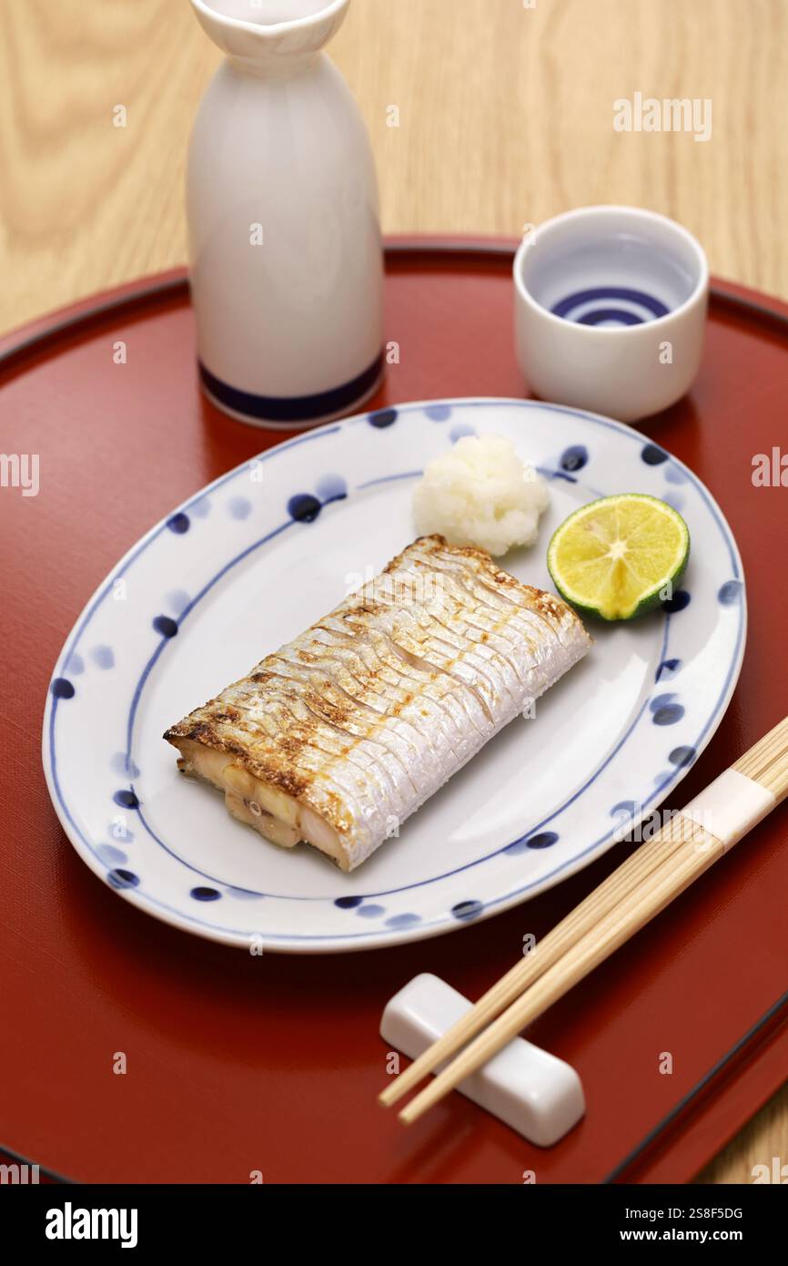 Salt-grilled hairtail fish, Japanese cuisine Stock Photo - Alamy