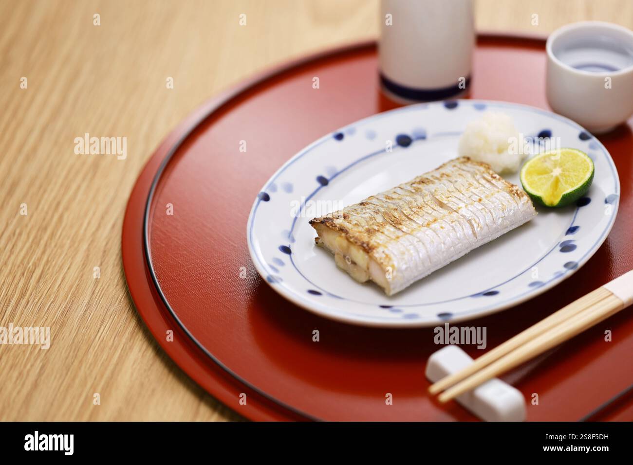Salt-grilled hairtail fish, Japanese cuisine Stock Photo - Alamy