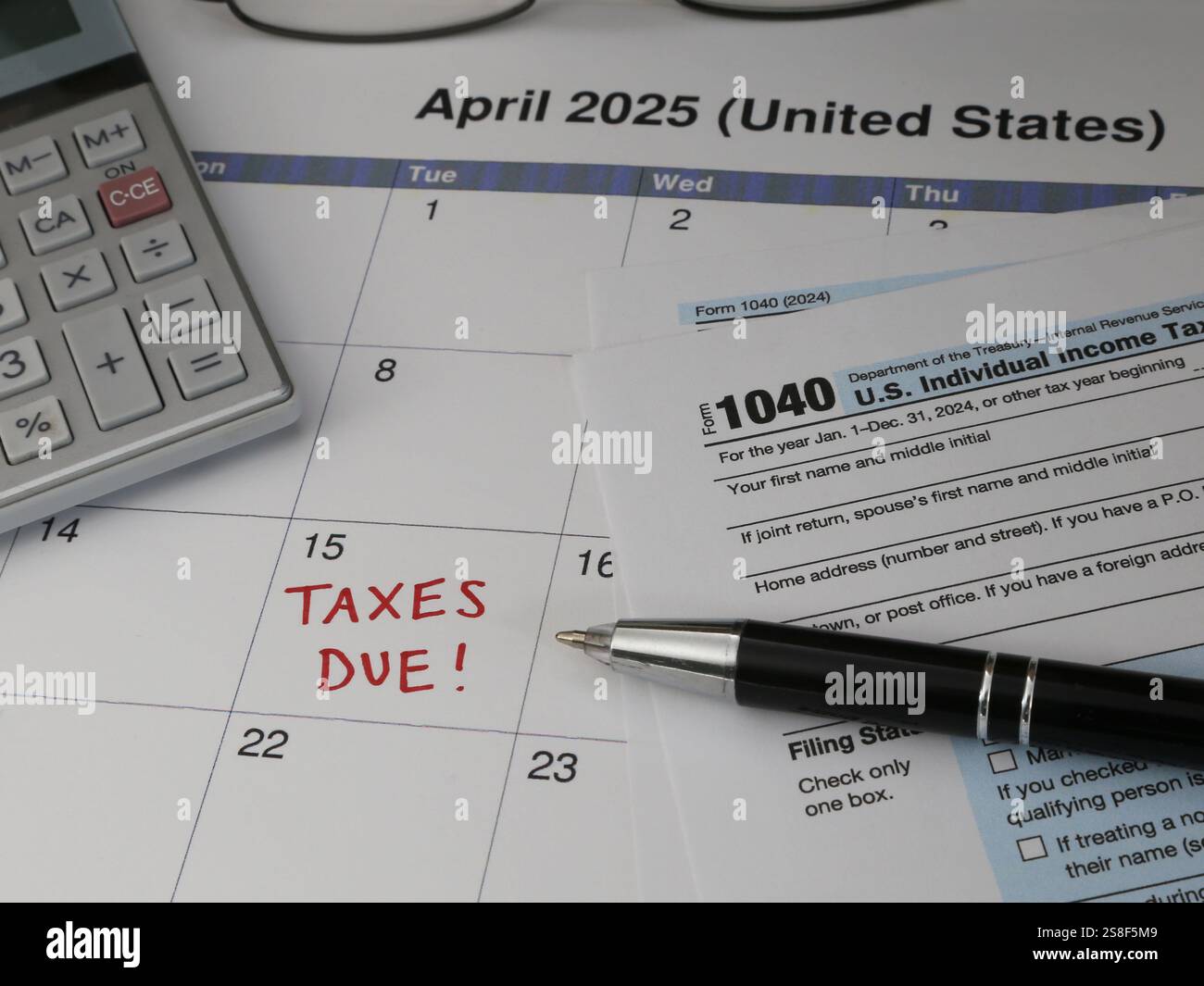 A 2025 calendar noting the April 15 USA Internal Revenue Service IRS income filing deadline for ...