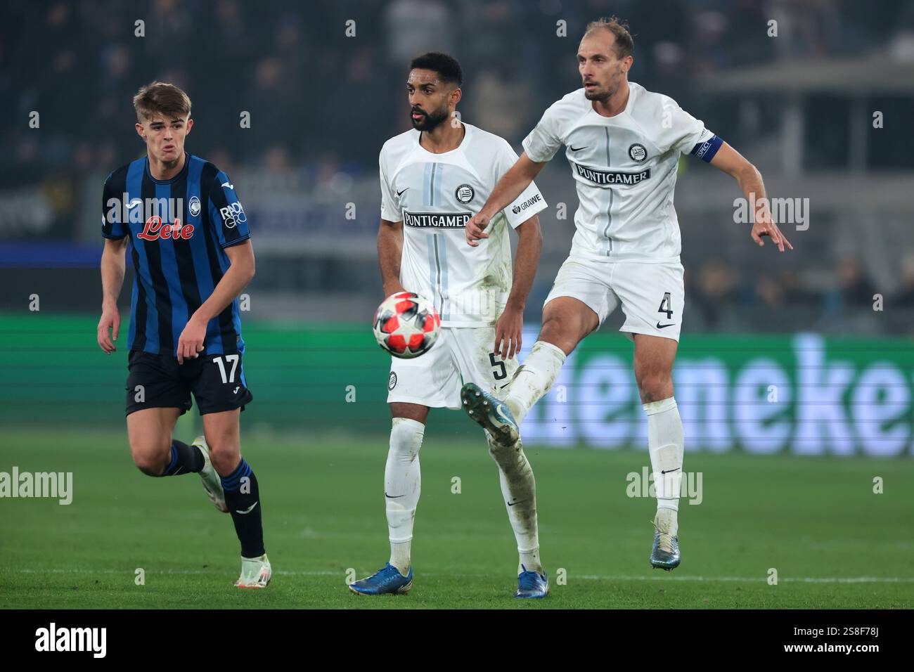 Bergamo, Italy. 21st Jan, 2025. Jon Stankovic of SK Sturm Graz clears ...