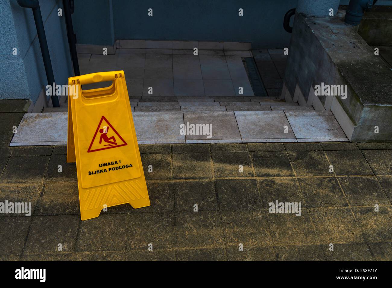 Beware, ice on the sidewalk, beware, slippery, wet stairs, yellow ...