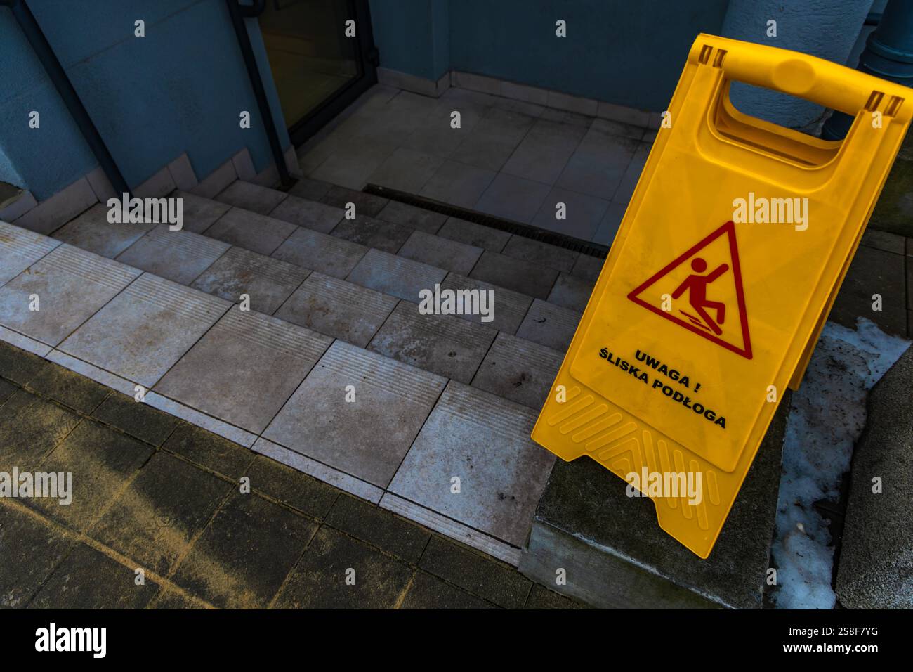 Beware, ice on the sidewalk, beware, slippery, wet stairs, yellow ...