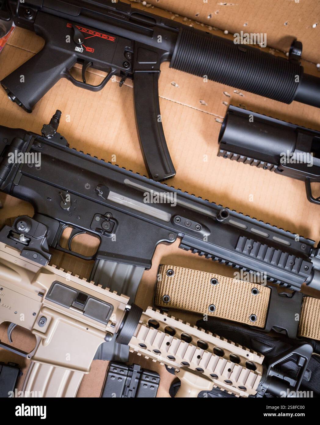 Assault rifle, gun, knife with sheath, compass Stock Photo - Alamy