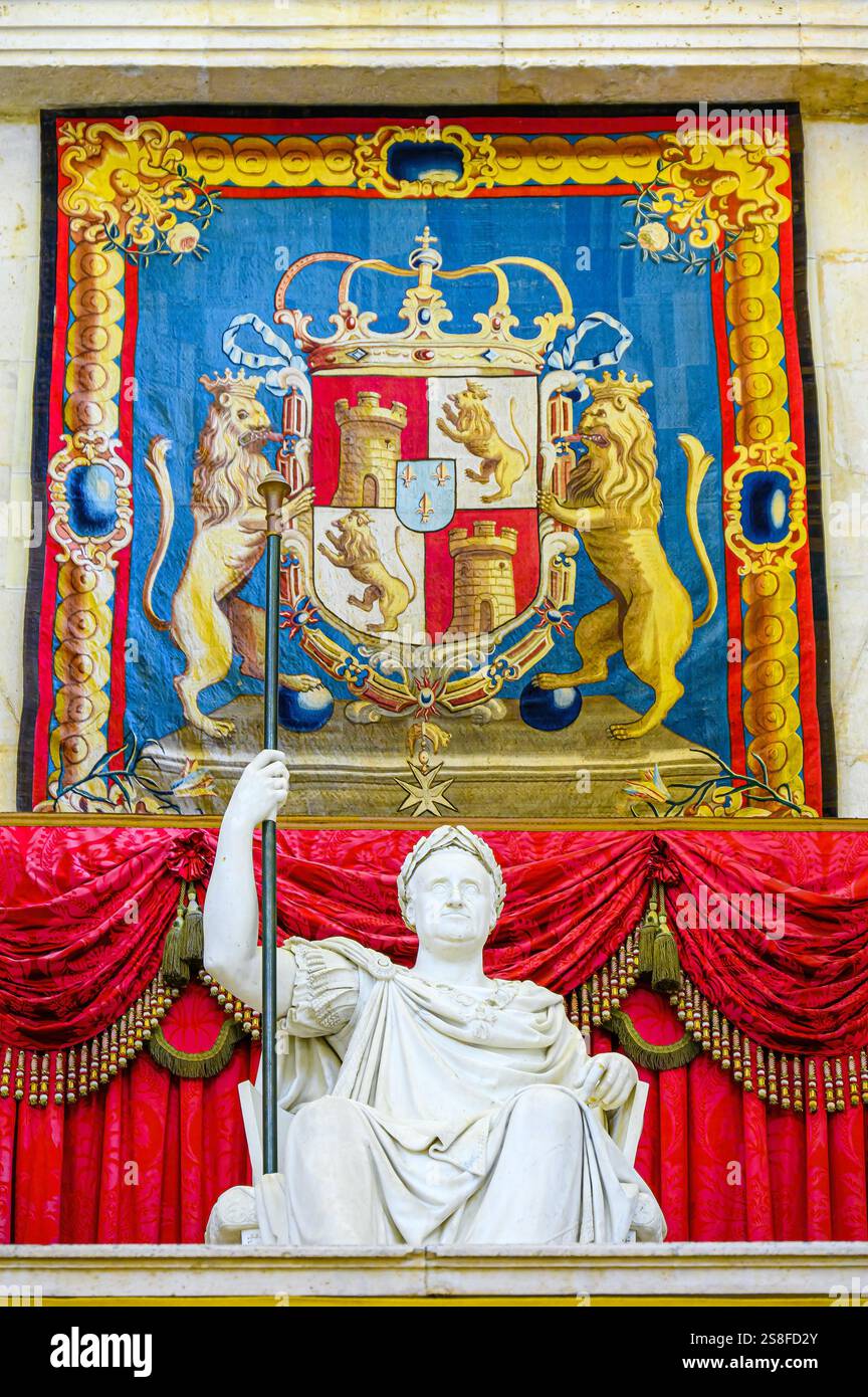 Spanish coat of arms and statue decorating the entrance lobby of the ...