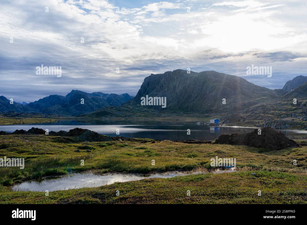 Hiking on the Arctic Trail in a beautiful landscape with lake and ...