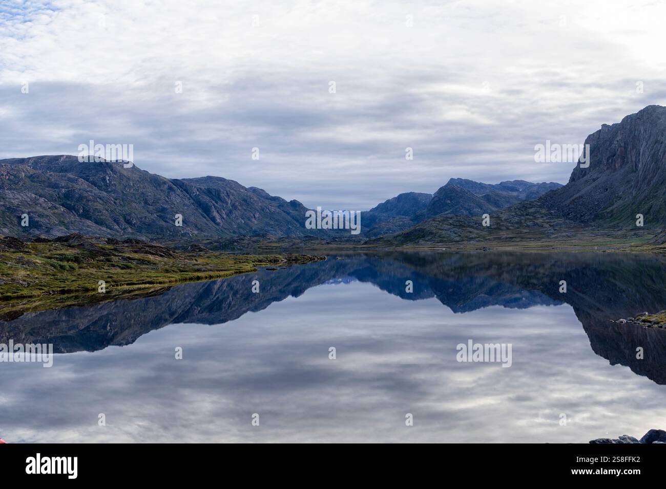Hiking on the Arctic Trail in a beautiful landscape with lake and ...