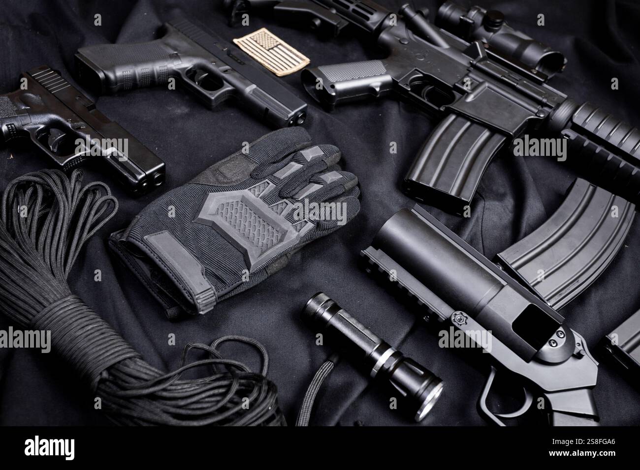 modern weapon, black background Stock Photo - Alamy
