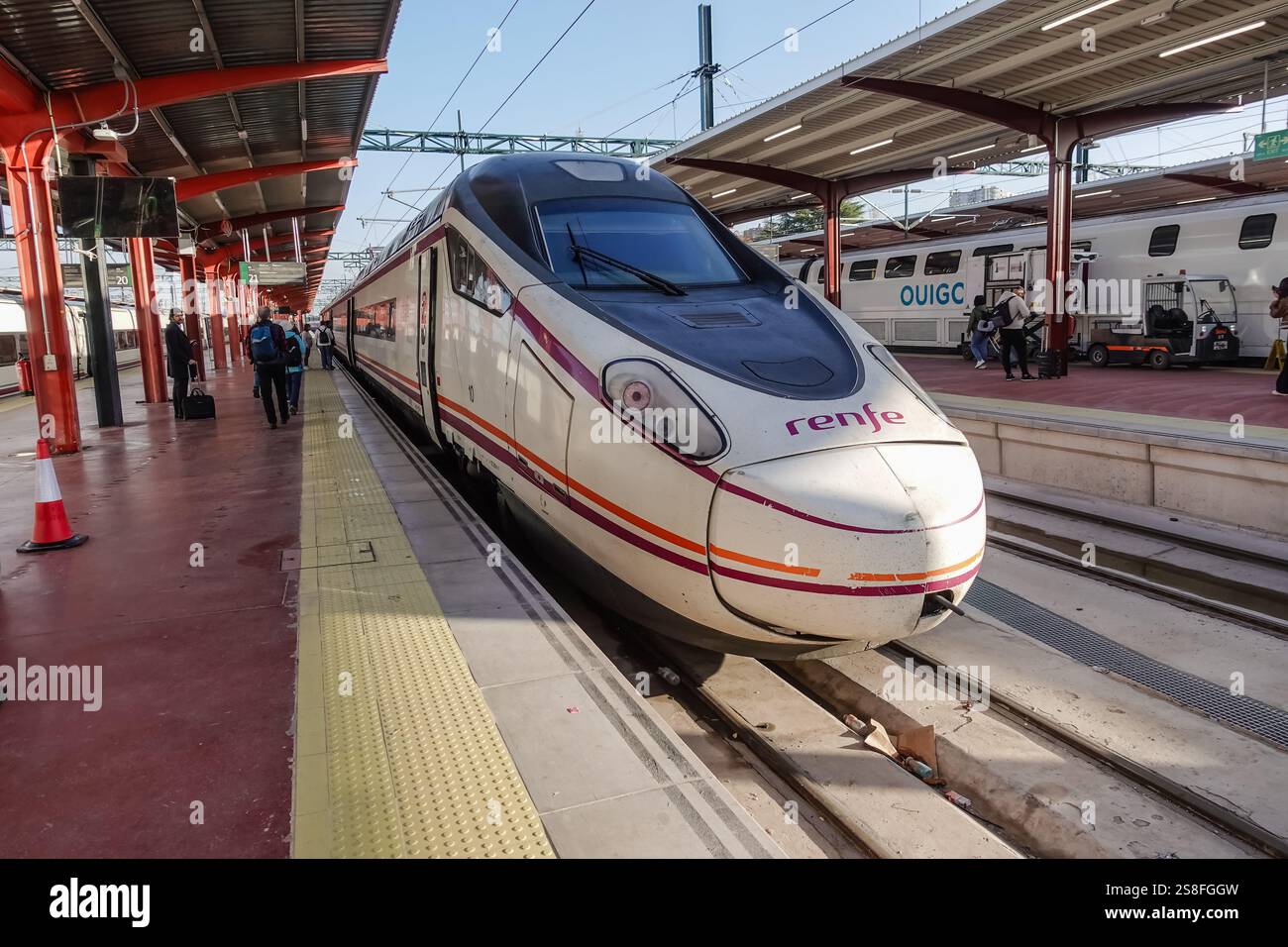 Renfe high speed train at a station in Spain Stock Photo - Alamy