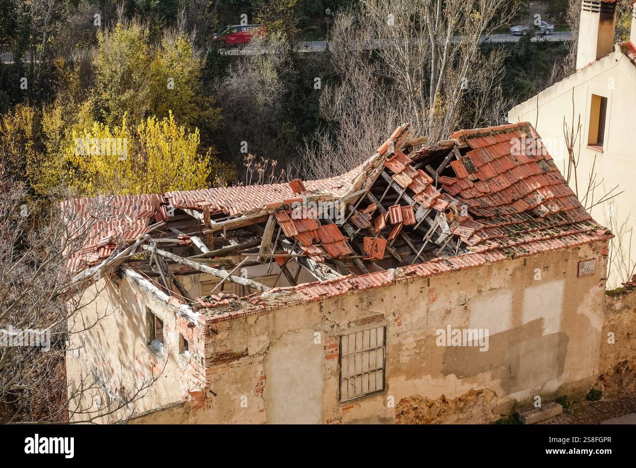 A house in Spain with a visibly destroyed rooftop Stock Photo - Alamy