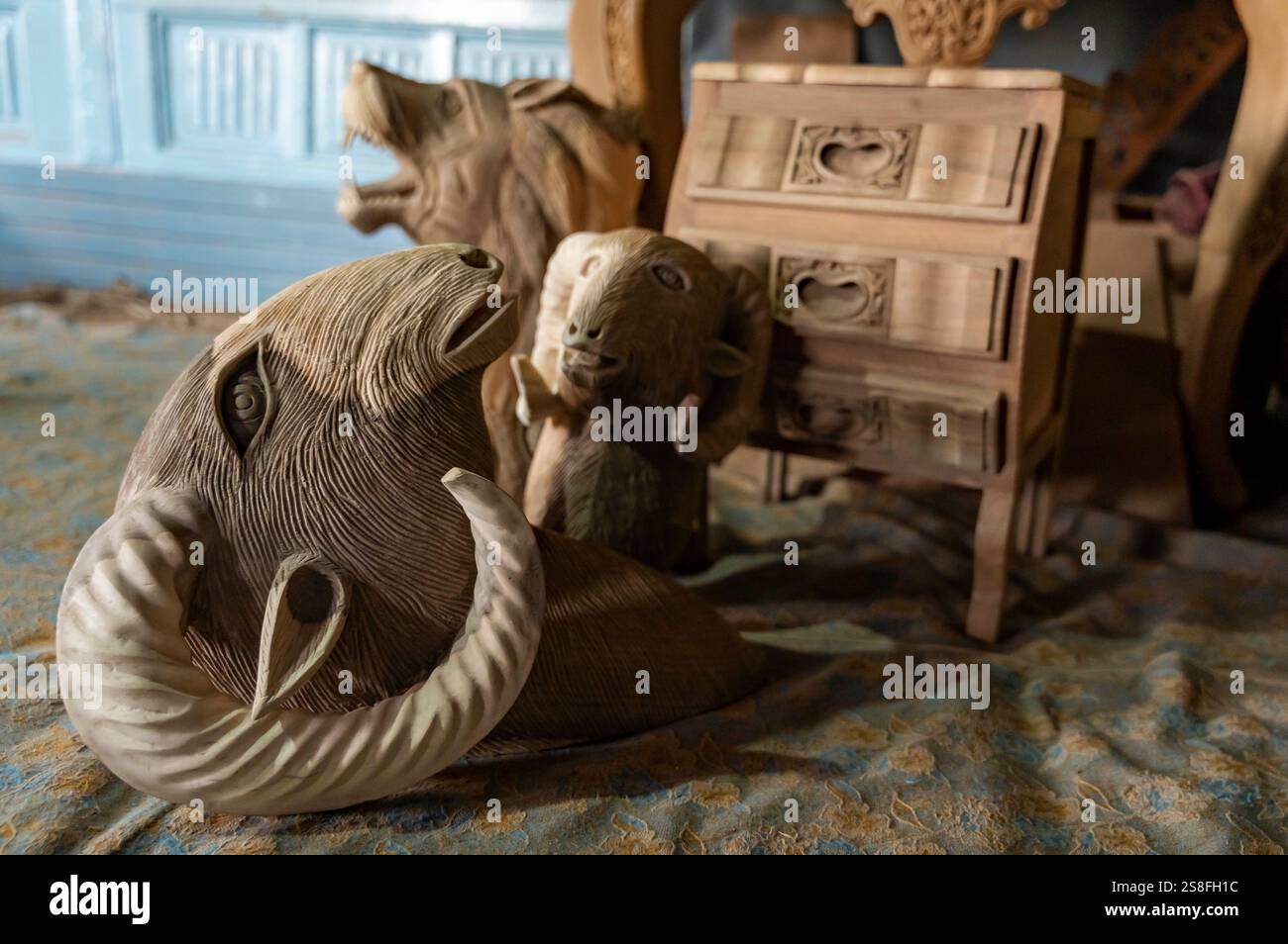 A view of handcrafted sculptures by Mohammed Yousaf Muran displayed at ...