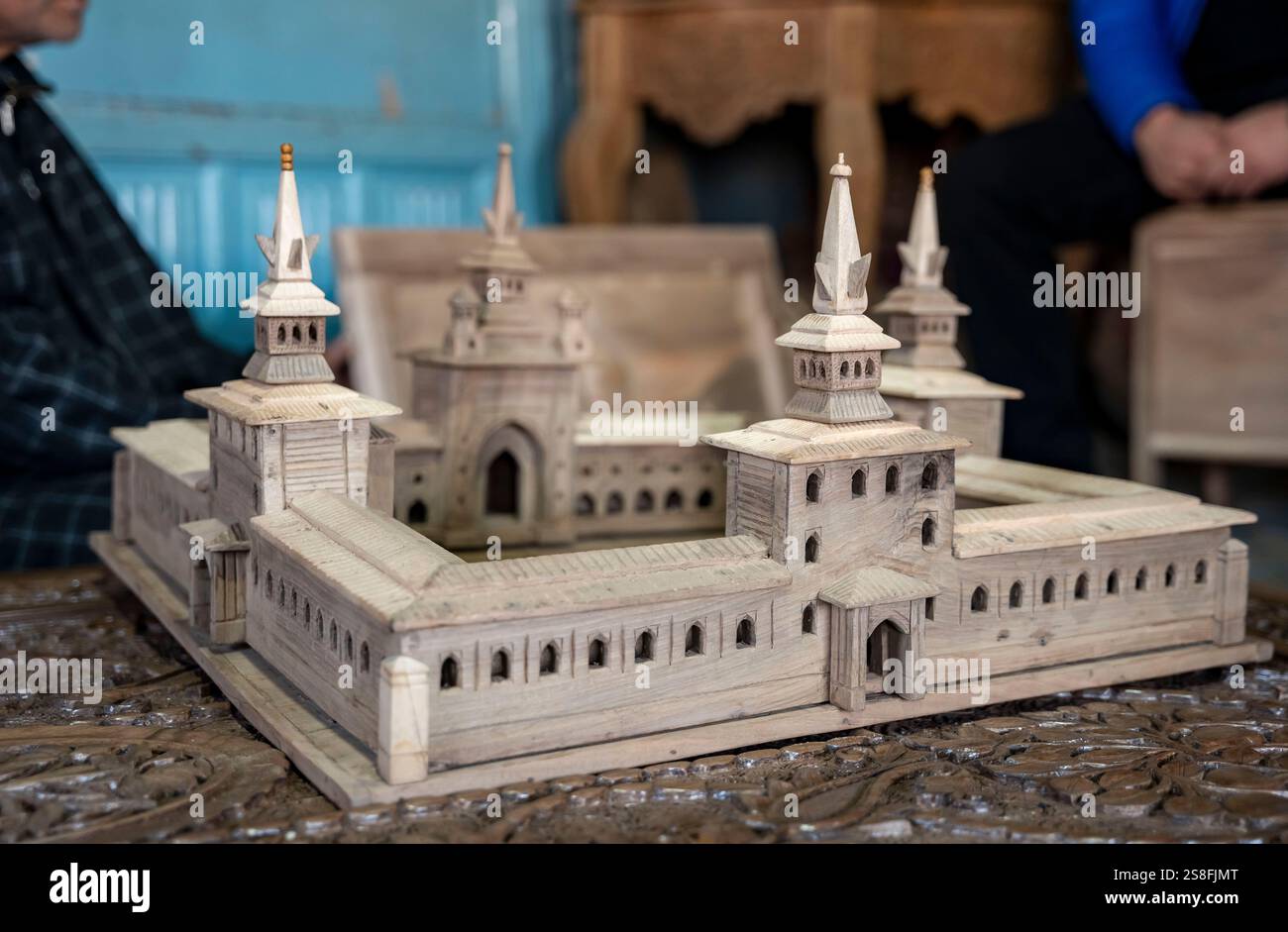 A view of a handcrafted walnut wood replica of Jamia Masjid Srinagar ...