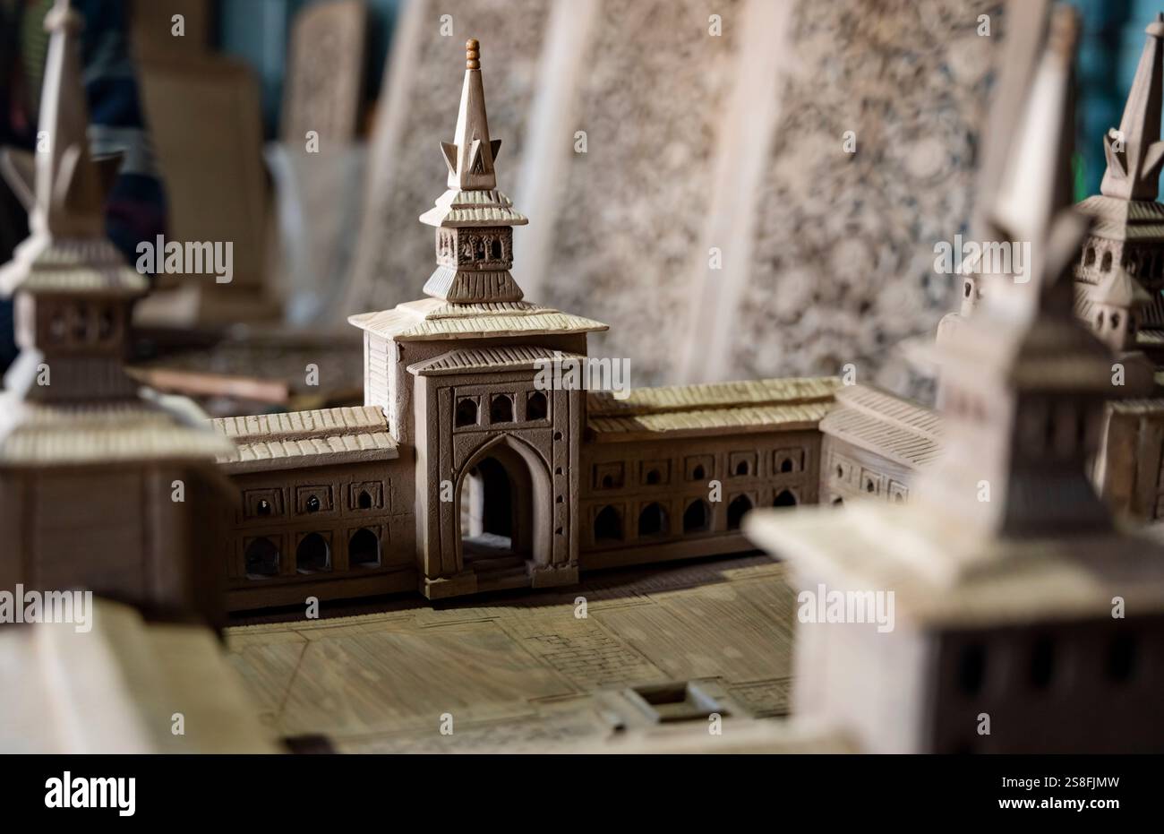 A view of a handcrafted walnut wood replica of Jamia Masjid Srinagar ...