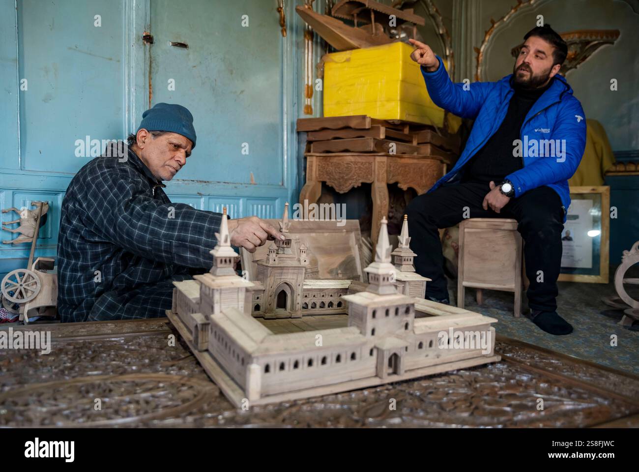 Mohammed Yousaf Muran showcases his handcrafted walnut wood replica of ...