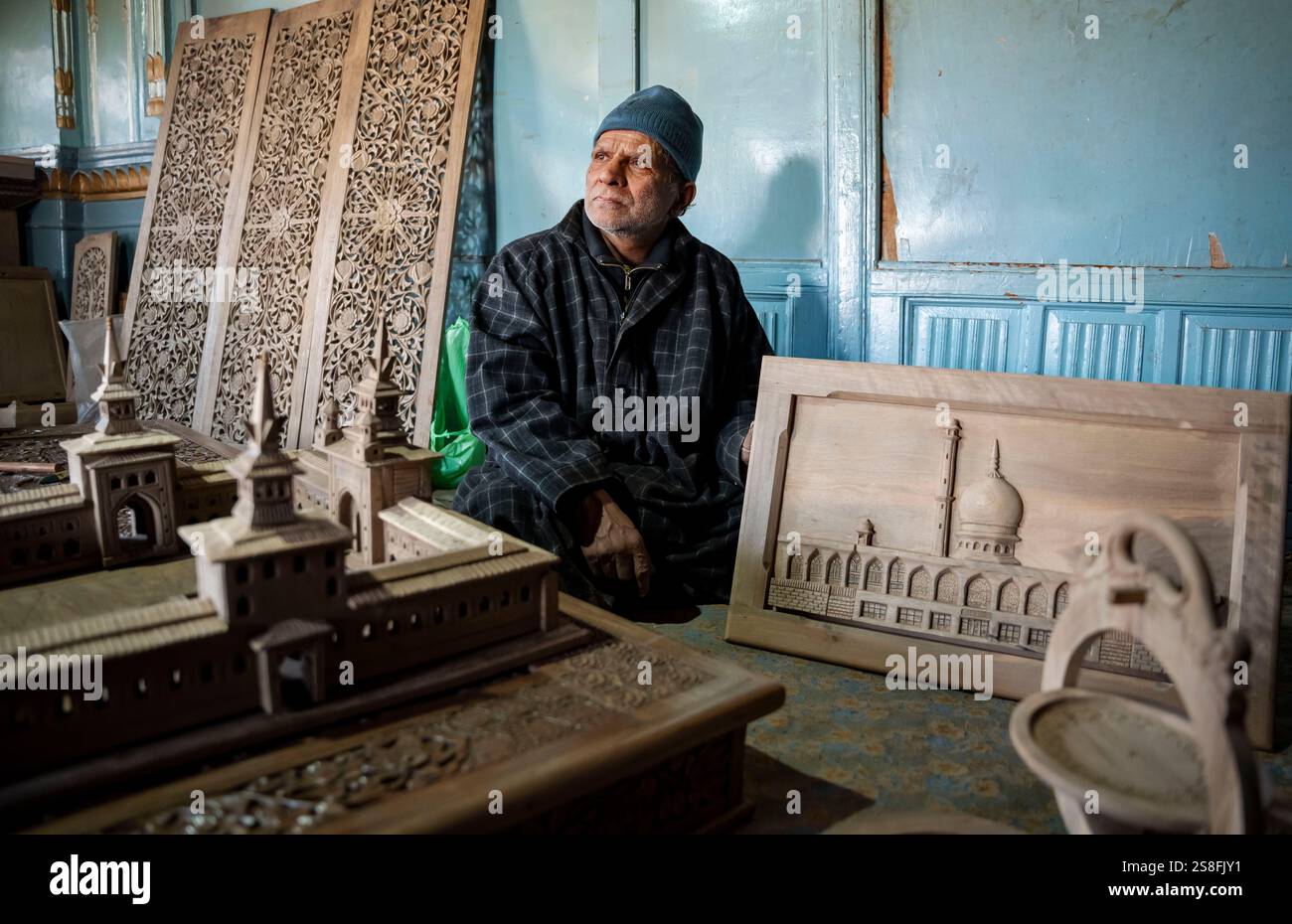 Mohammed Yousaf Muran displays his handcrafted walnut wood replica of ...