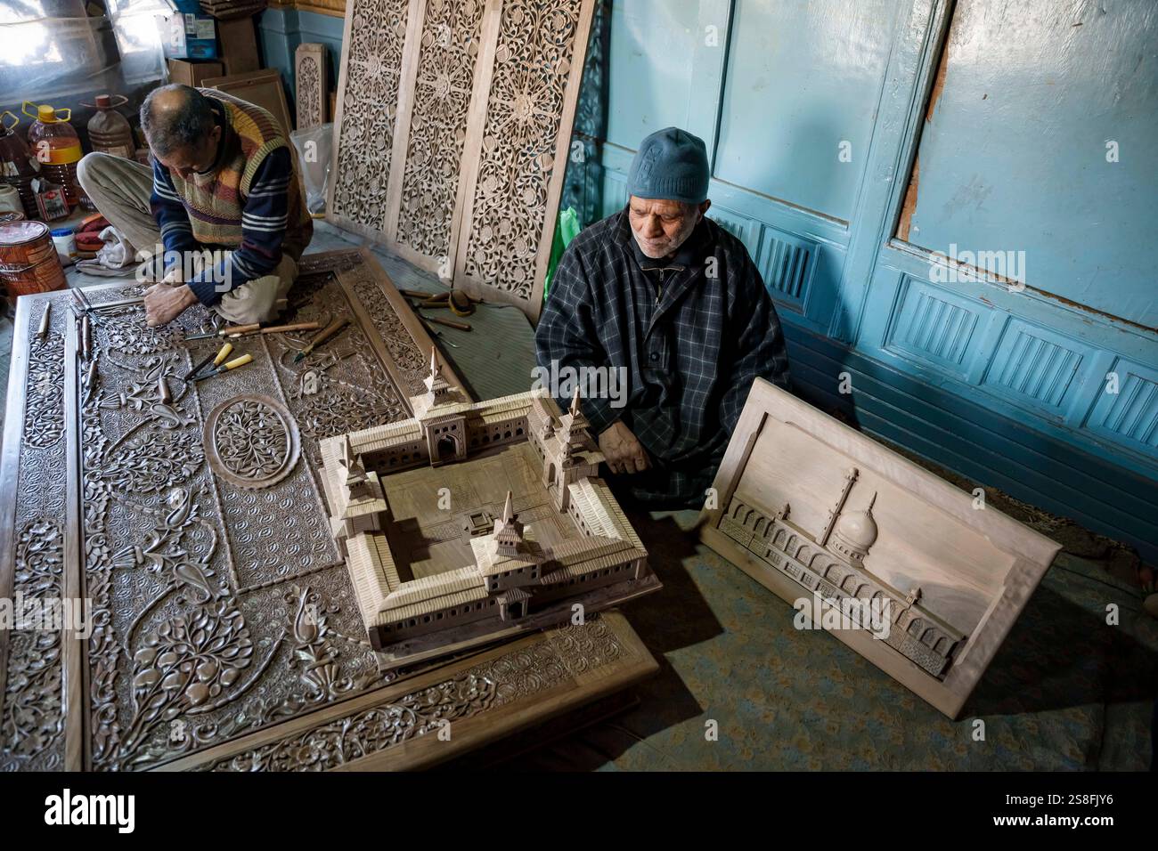 Mohammed Yousaf Muran displays his handcrafted walnut wood replica of ...