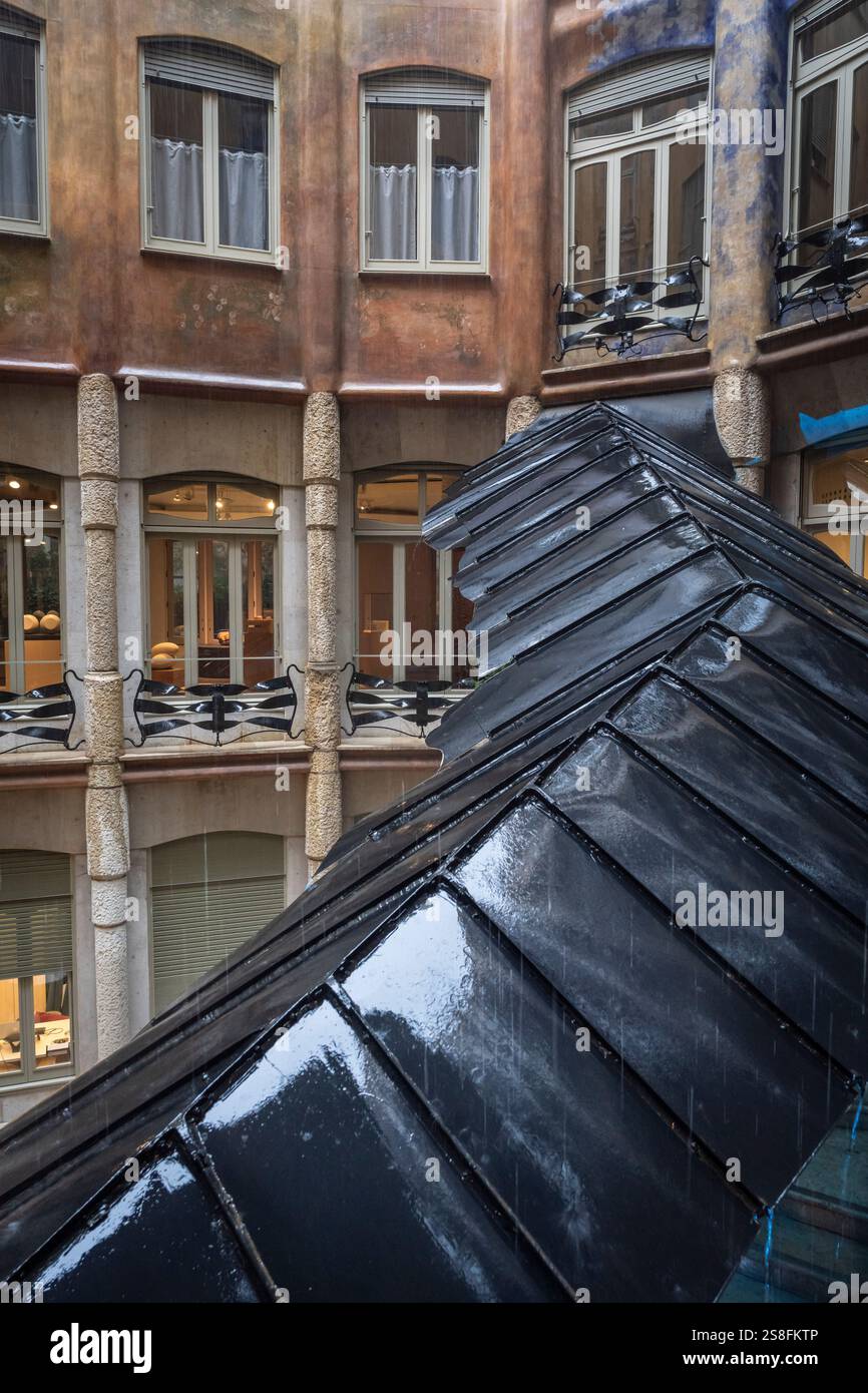 Large elliptical patio windows in the rain, Casa Milà-La Pedrera ...