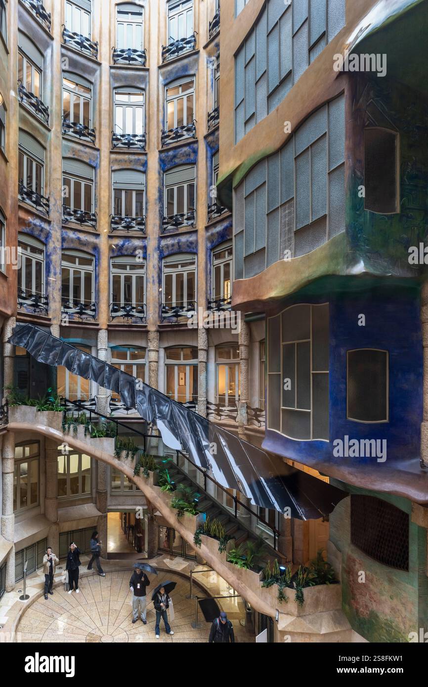 Large elliptical patio windows in the rain, Casa Milà-La Pedrera ...