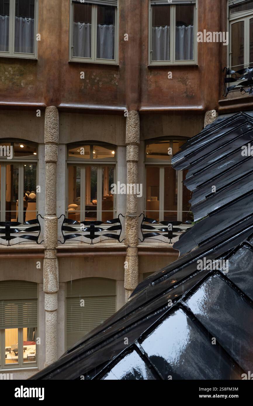 Large elliptical patio windows in the rain, Casa Milà-La Pedrera ...