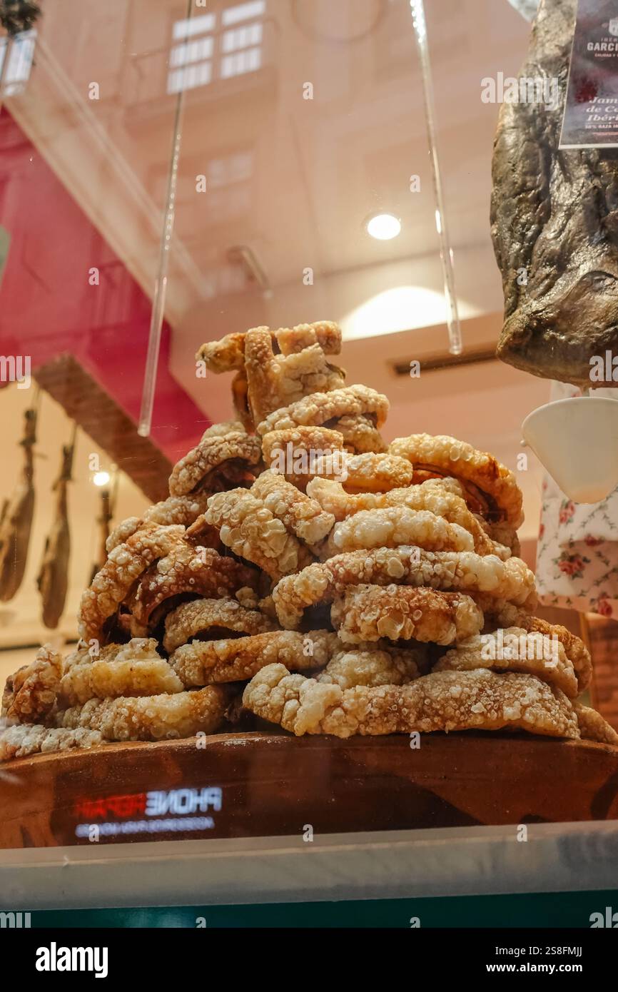 A shop in Segovia, Spain, selling Torreznos, a delicious fried pork ...