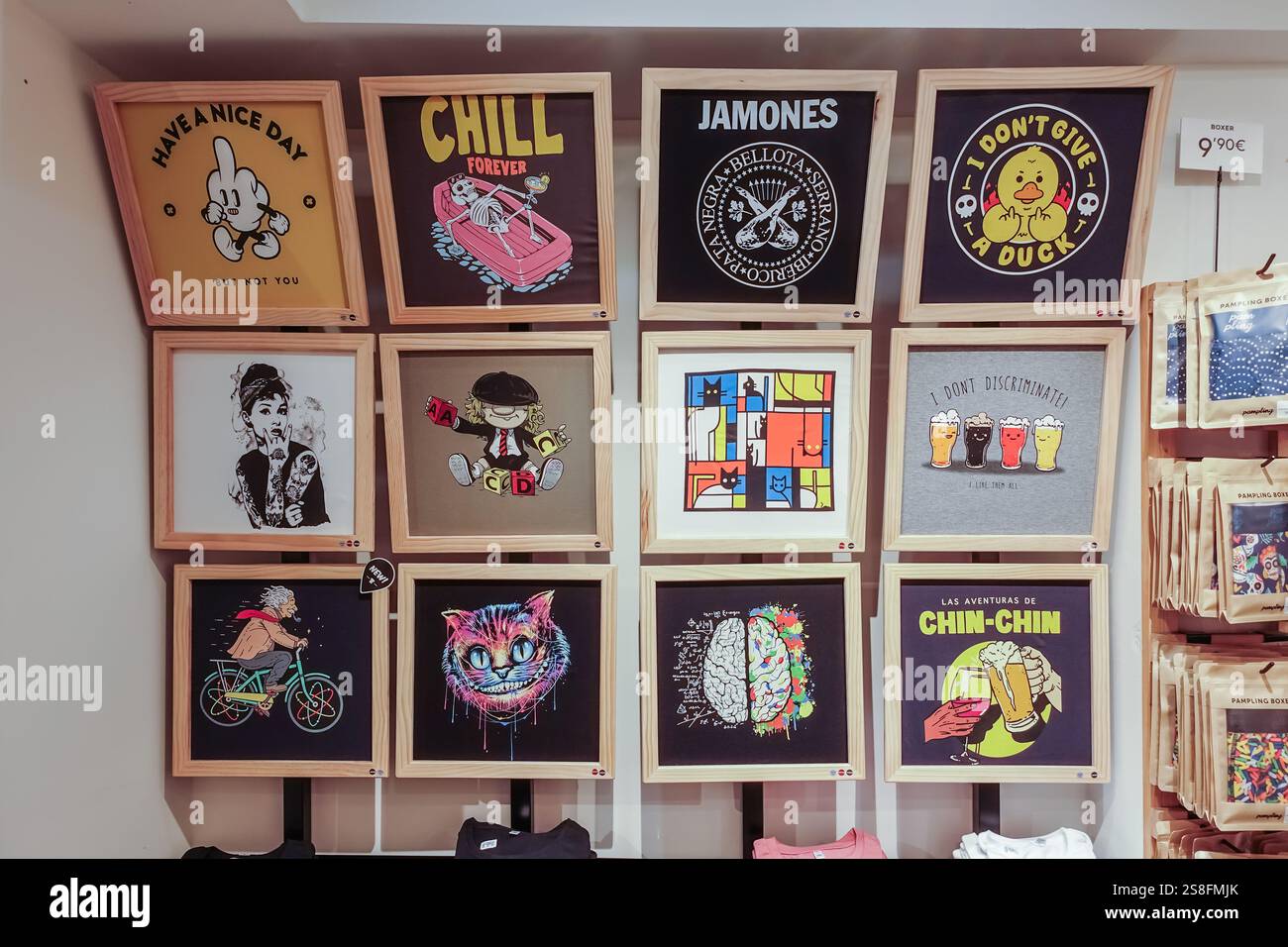 A shop in Segovia, Spain, offering a variety of t-shirt designs ...