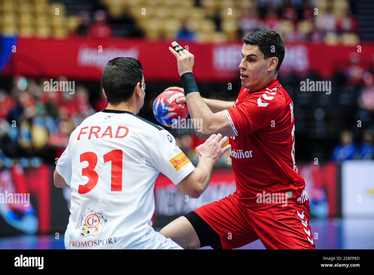Mohamed Ridha Frad (Tunesien, #31), Luka Maros (Schweiz, #20) DEN, Schweiz vs. Tunesien ...