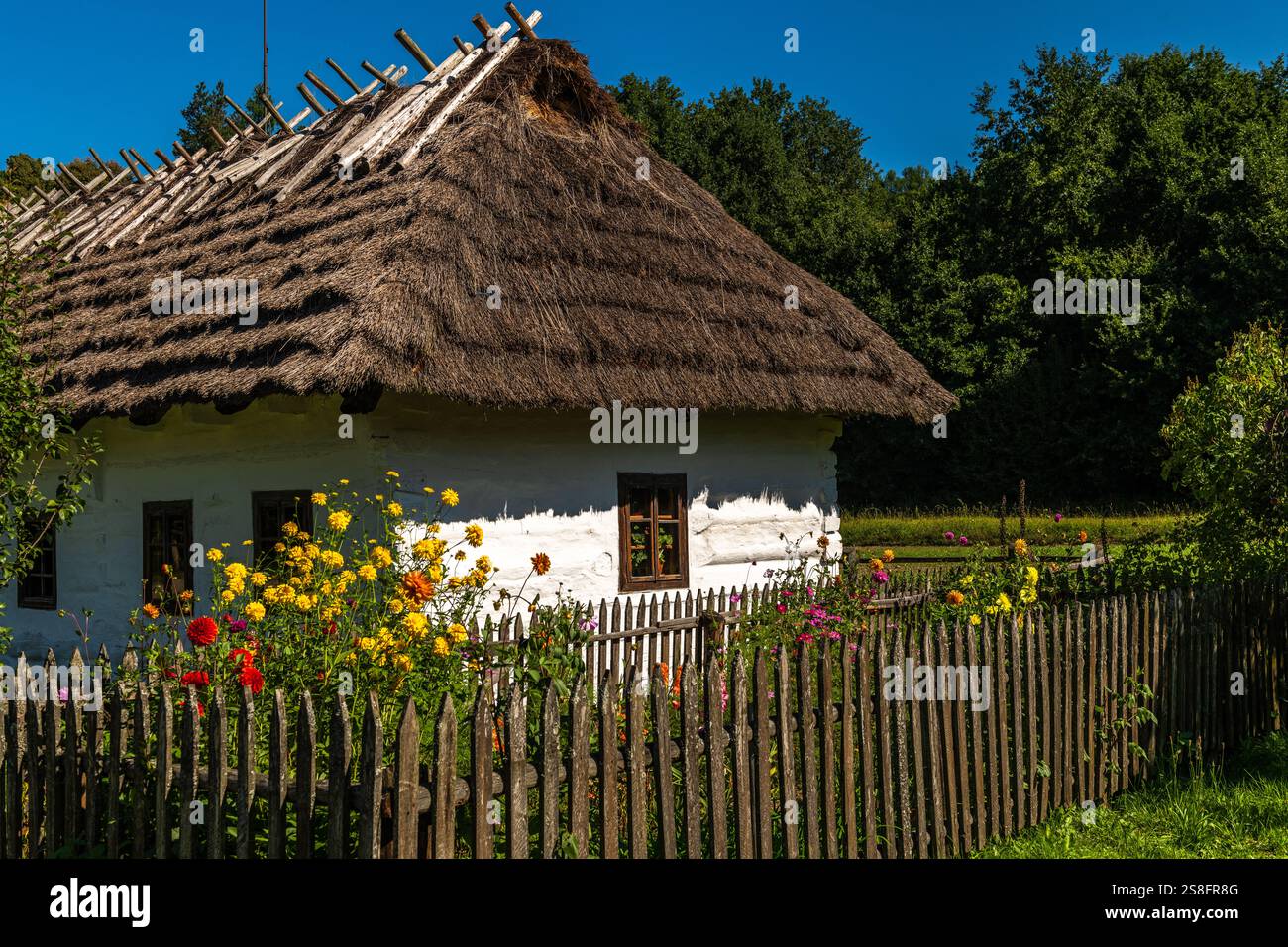 TRaditional polish wooden houses in etnoraphic village Stock Photo - Alamy