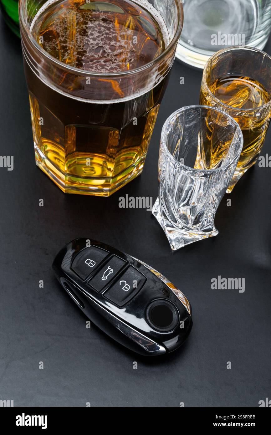 Car key on the bar with spilled alcohol Stock Photo - Alamy