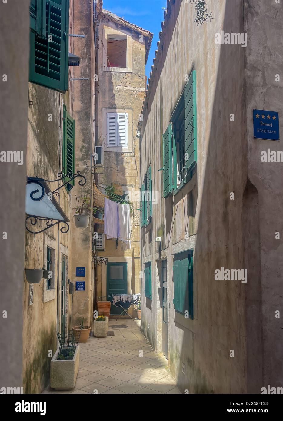 Split, Croatia - July 1, 2024: Historic downtown. Laundry hangs outside ...