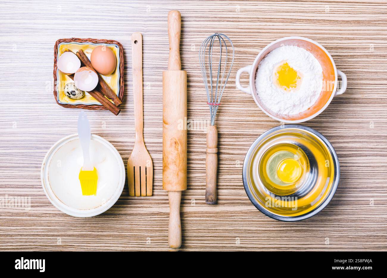 Wooden background with baking ingredients. Top view Stock Photo - Alamy