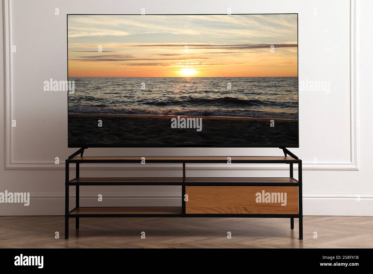 TV set with nature landscape on screen in room Stock Photo - Alamy