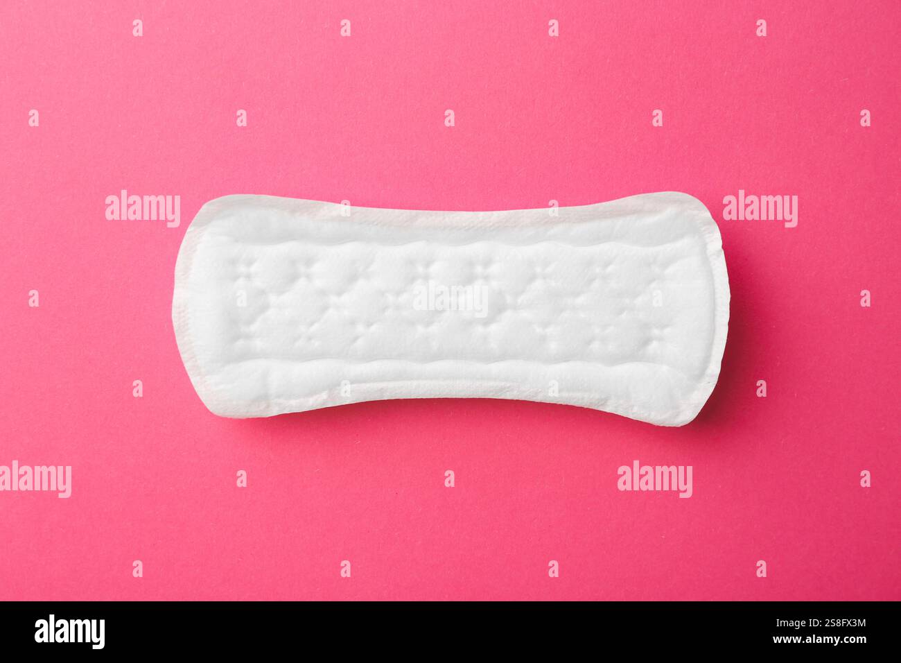 Menstrual pad on pink background, top view Stock Photo - Alamy